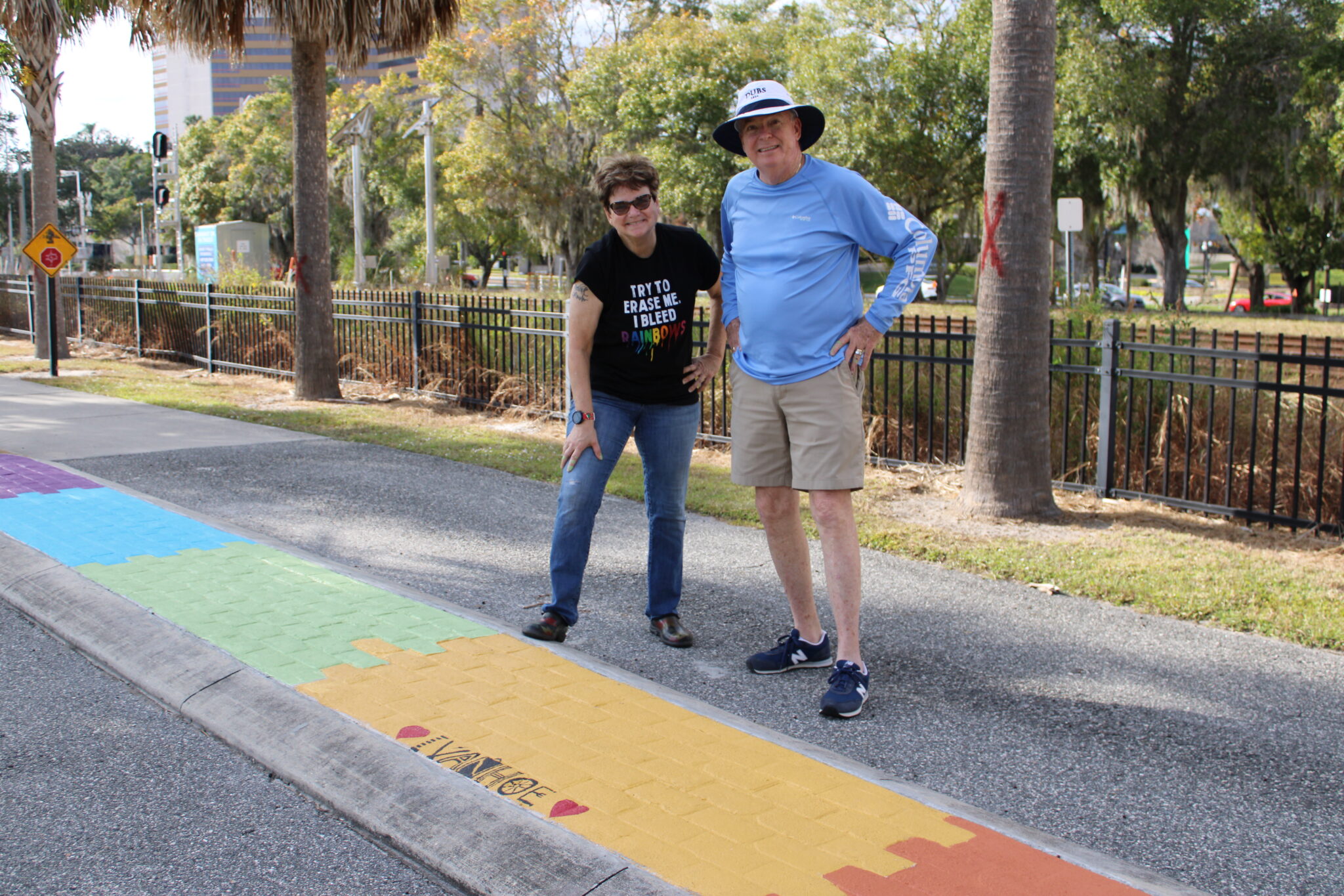 PHOTOS: Orlando commissioners paint rainbow medians on Urban Trail ...